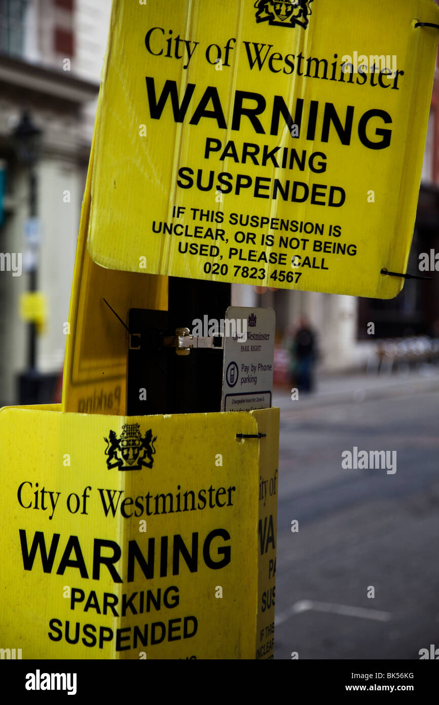 Parking suspended warning signs. Central London Stock Photo - Alamy