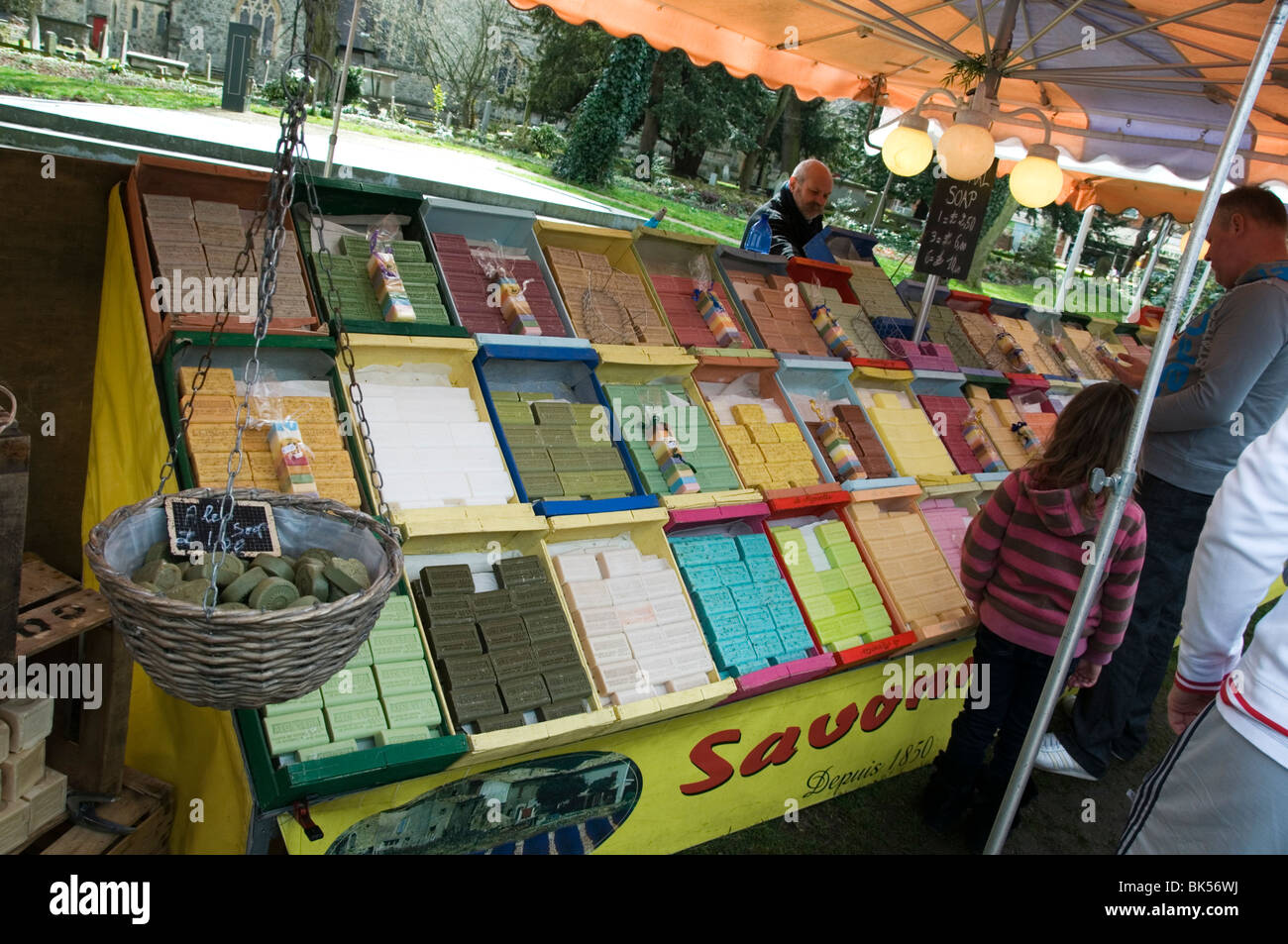 A stall on a French market in England selling handmade soaps Stock ...