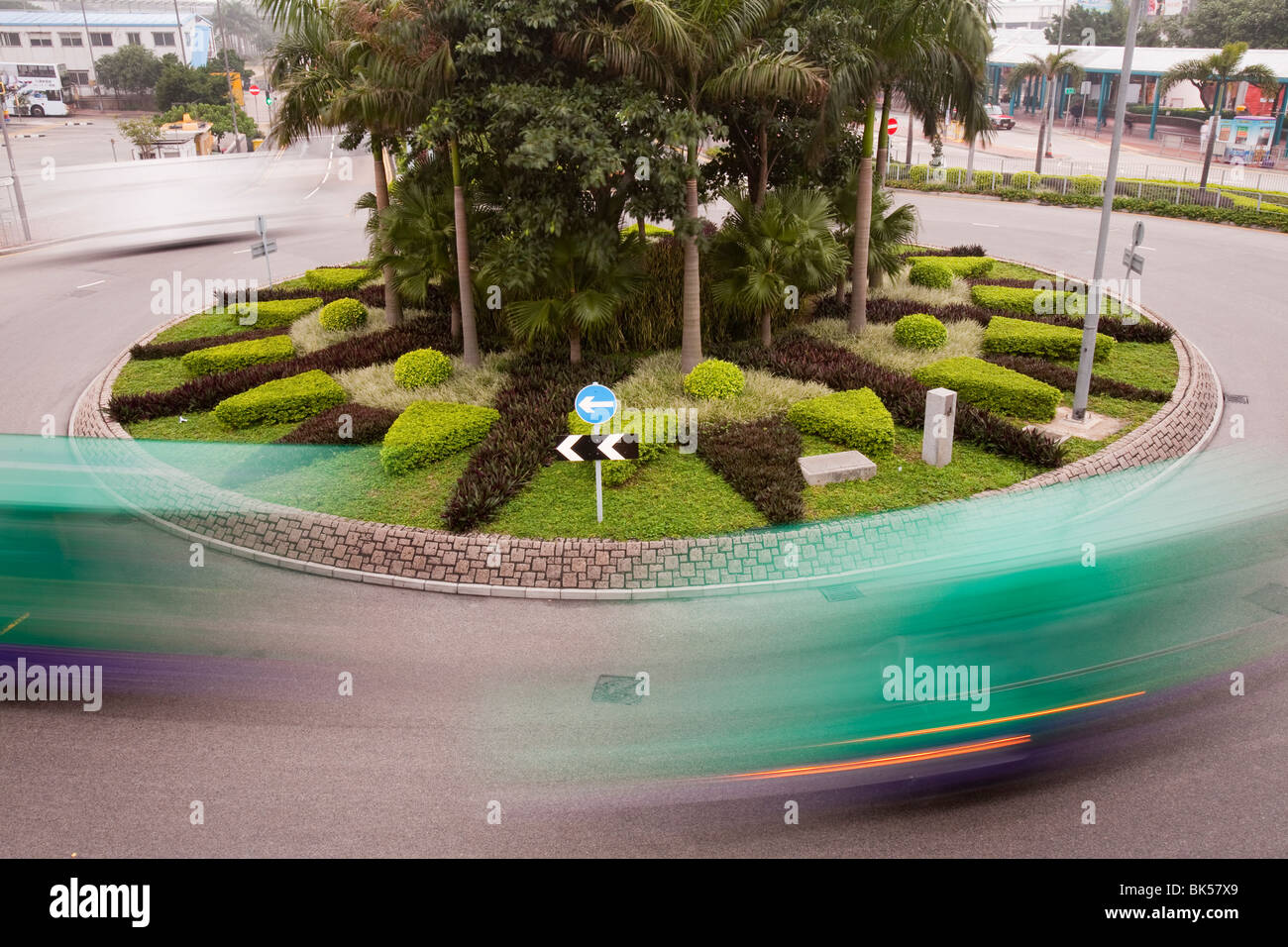 Bus going round a roundabout in Hong Kong, China Stock Photo - Alamy