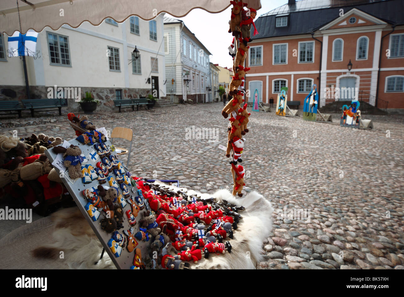 Local handicrafts stall and medieval Town Hall, Old Town Square, Porvoo ...