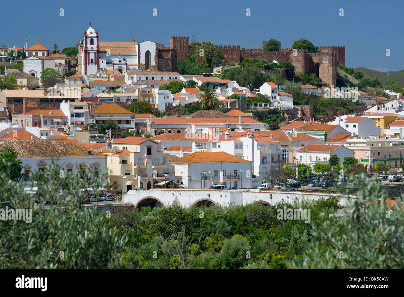Portugal, The Algarve, Silves, Town And Castle Seen Over Orange Groves ...