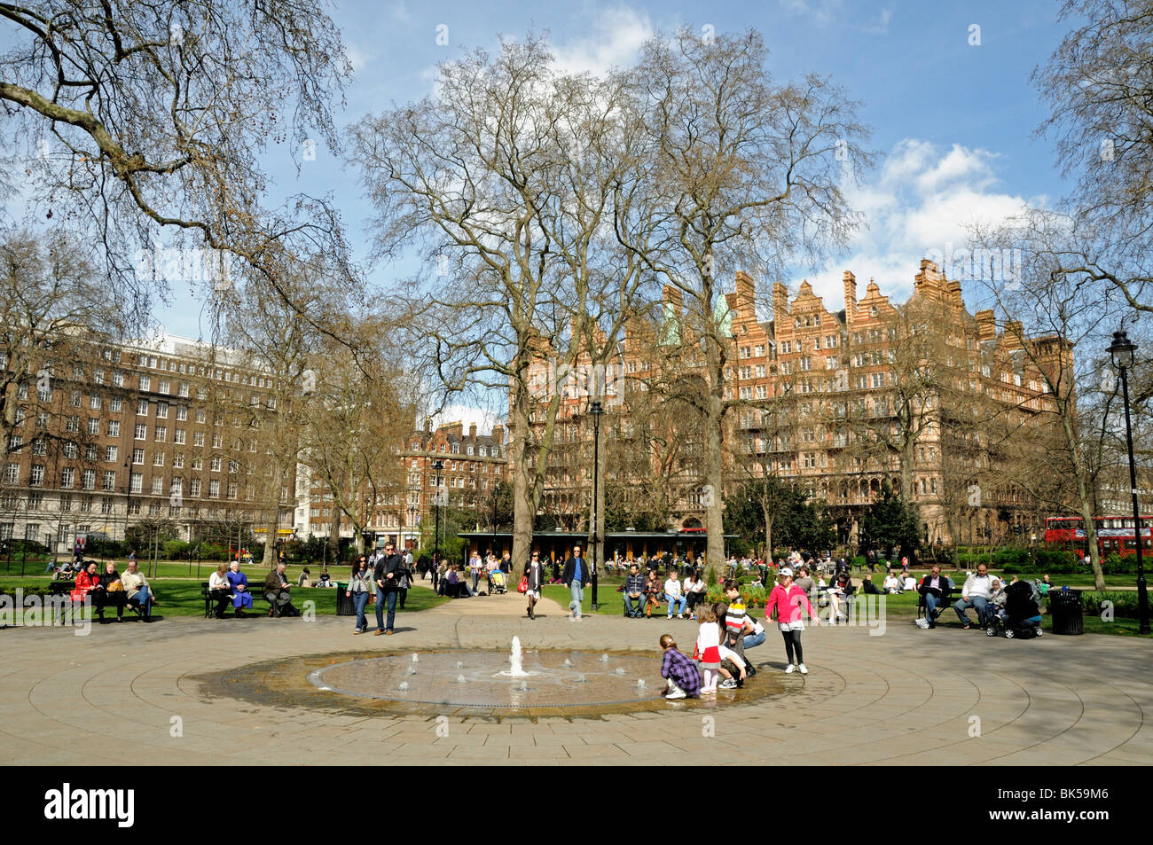 Russell Square with people and fountain Bloomsbury London England UK ...