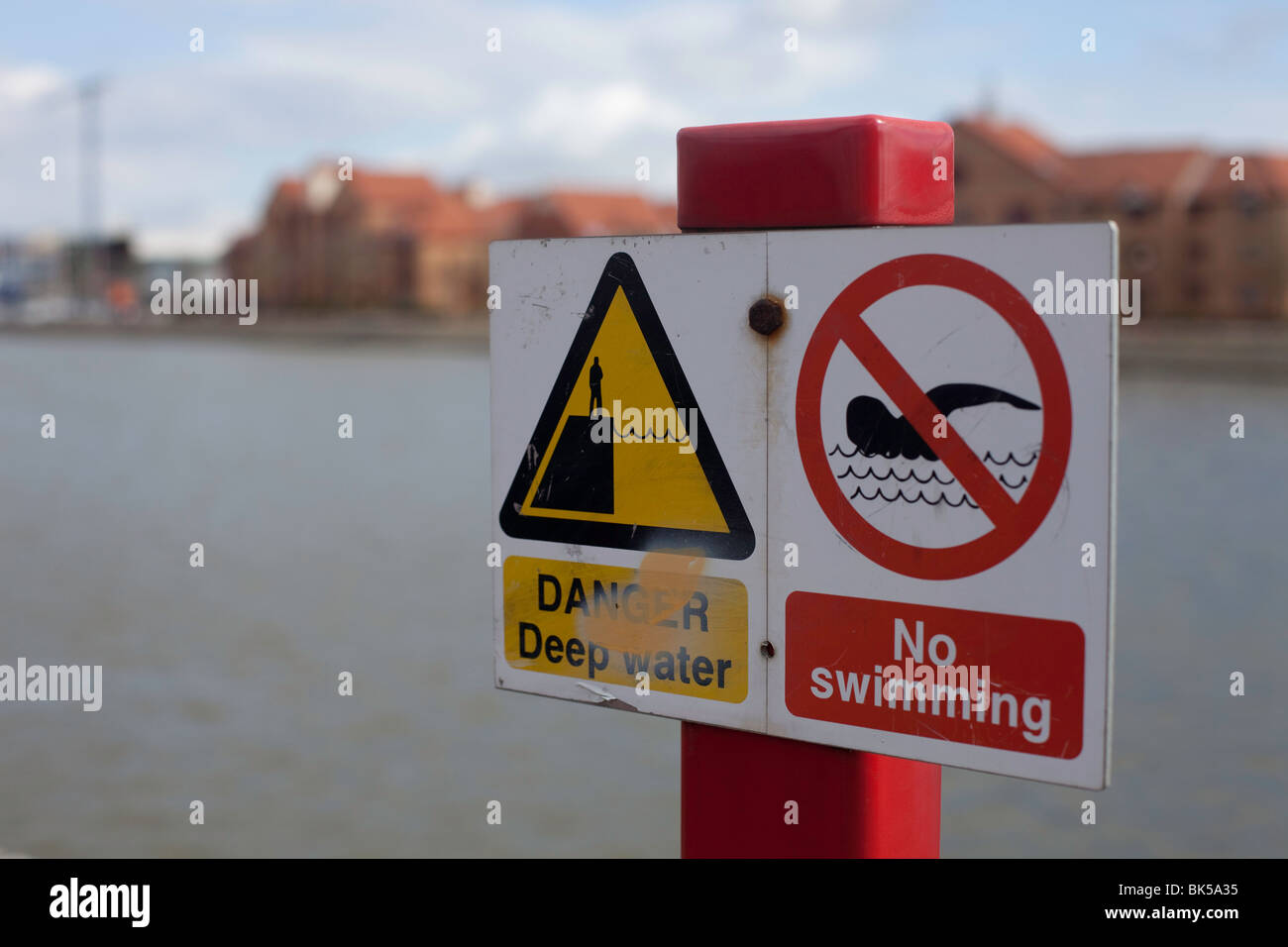Water safety sign by the edge of a river Stock Photo - Alamy