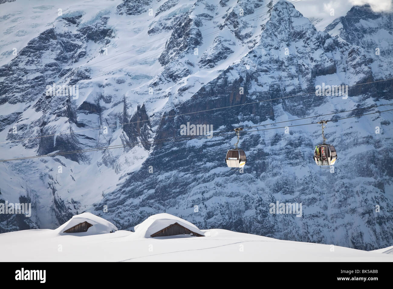 Gondola ski lift passing in front of the Wetterhorn mountain ...
