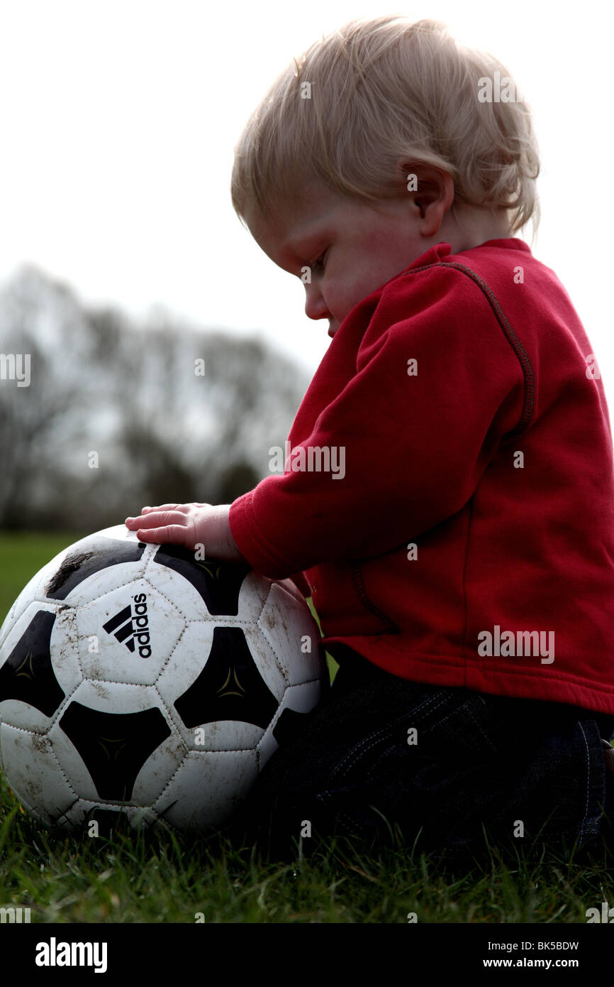 child with a football Stock Photo - Alamy