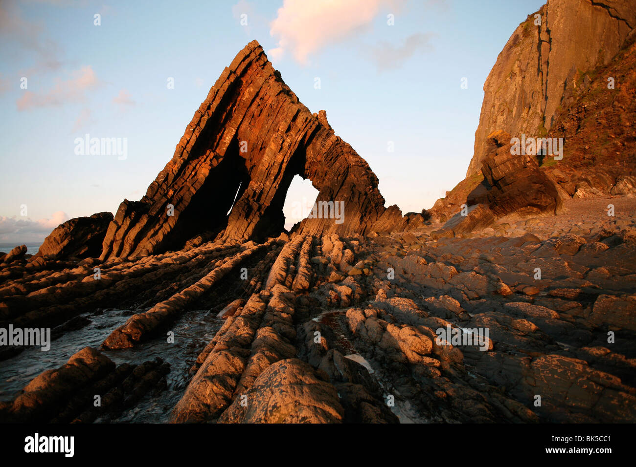 The light of the setting sun illuminates the unusual architecture of ...