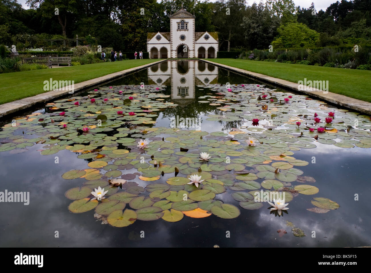 A perspective view of the pond at Bodnant Gardens in Wales leading to ...