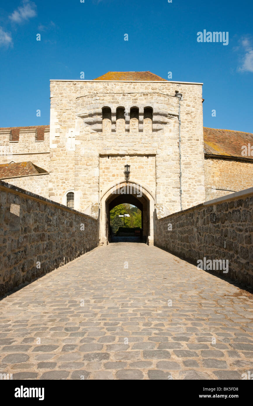 Path leading to medieval gate of castle against blue sky Stock Photo ...