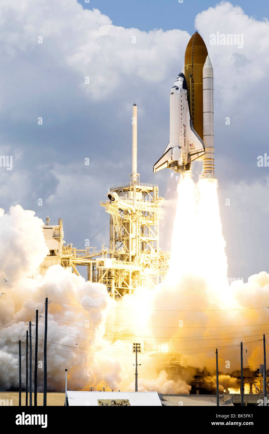 Space Shuttle Atlantis and its seven-member crew head toward Earth's ...