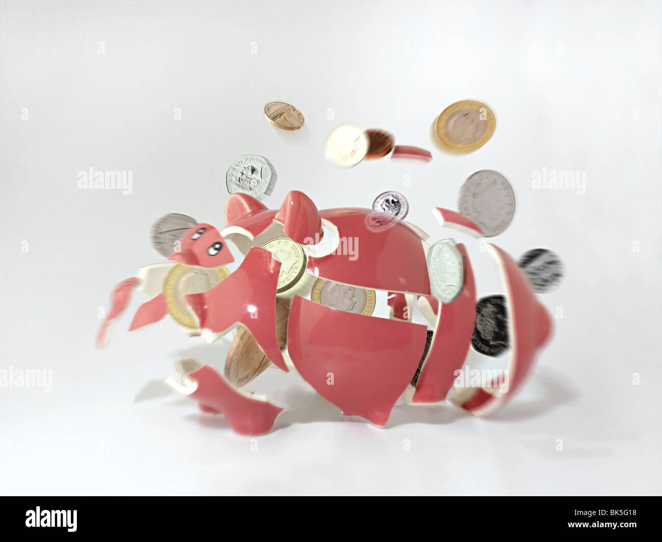 Exploding pink piggy bank depicting out of control savings, finances or ...