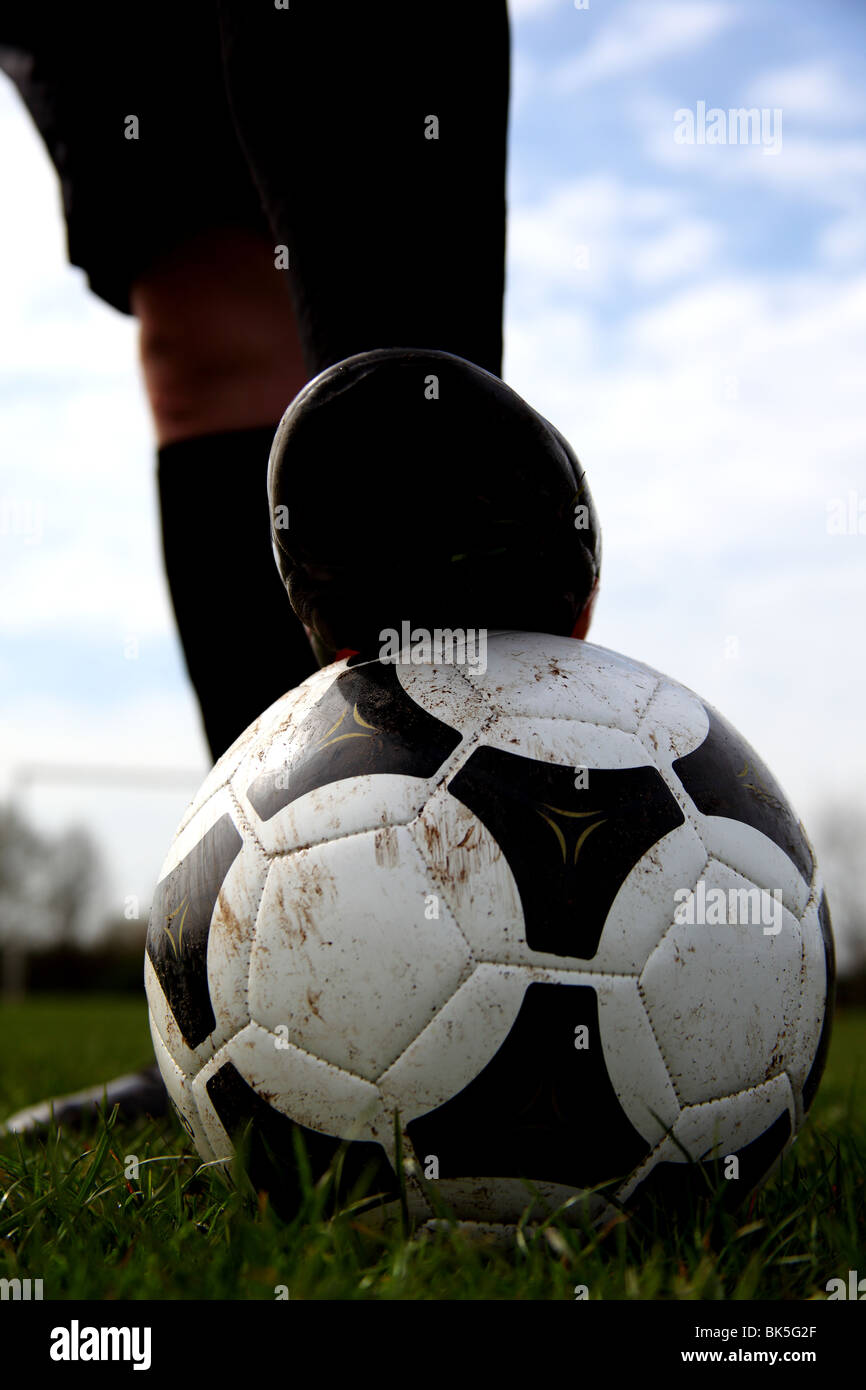 football and football boots Stock Photo - Alamy