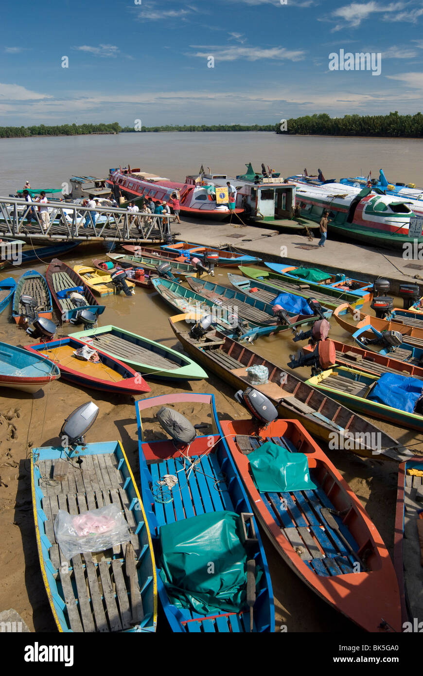 Colourful sampans and river boats on the Rejang River at Sarakei ...