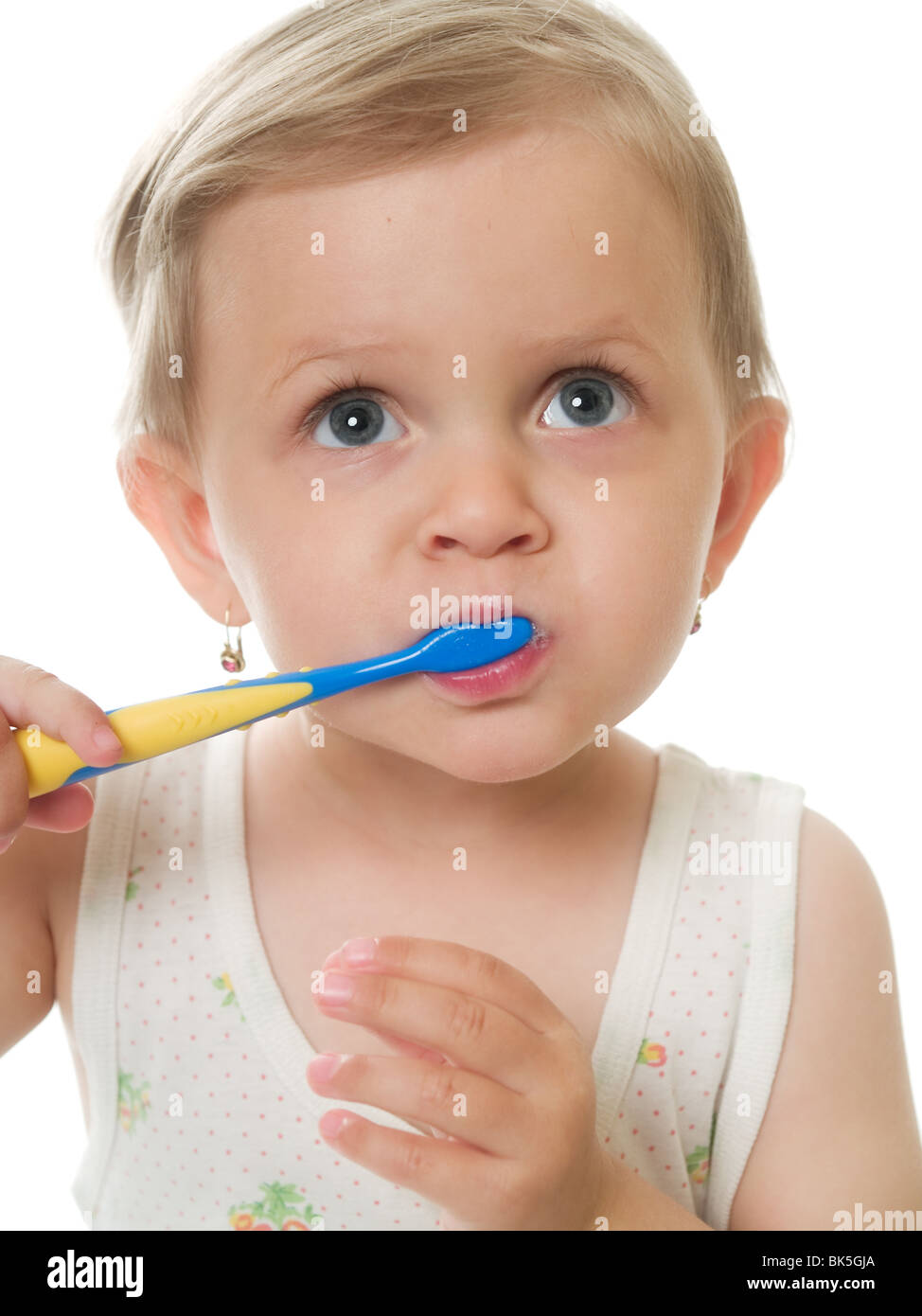Studio portrait baby with toothbrush Stock Photo - Alamy