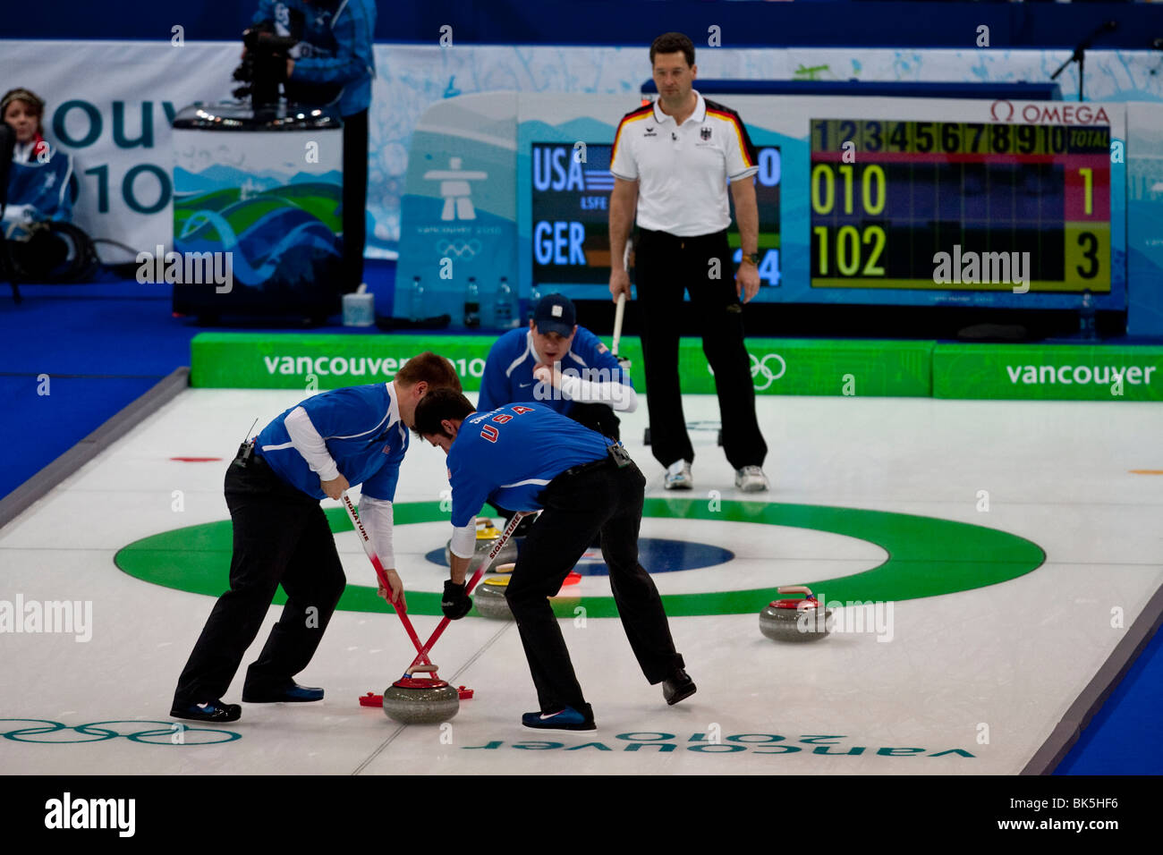 Team USA John Shuster (skip) Jason Smith and Jeff Isaacson competing in ...