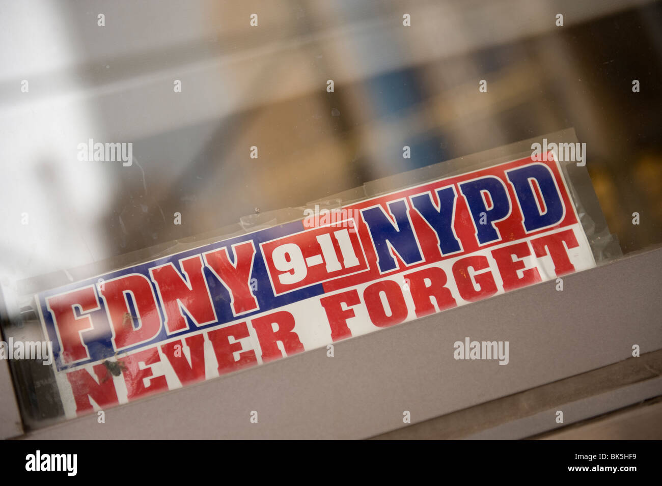 FDNY/NYPD sticker on fire station window, Ground Zero, New York, USA ...