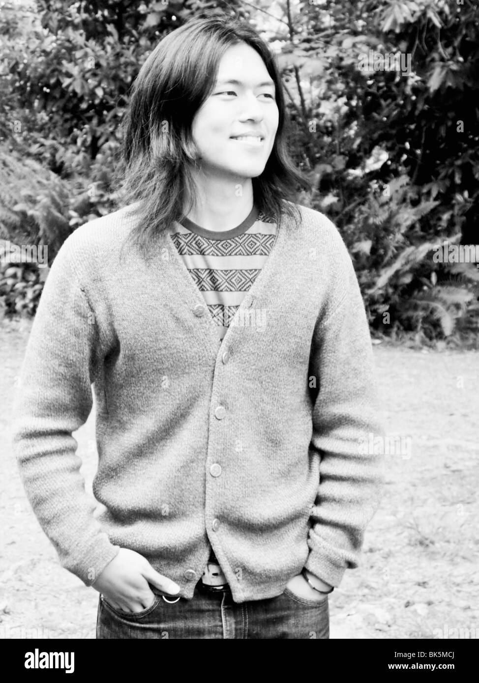 Young man in white long Black and White Stock Photos & Images - Alamy