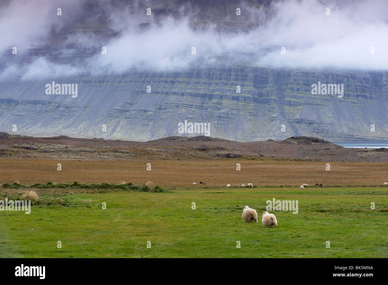 Mount Bulandstindur, 1069m, pyramid shaped stack of basaltic strata, in ...