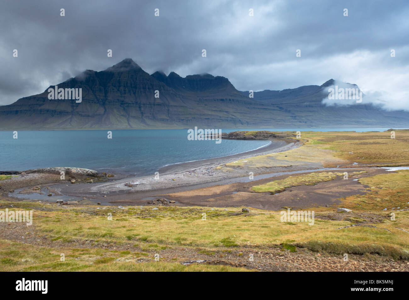 Mount Bulandstindur, 1069m, pyramid shaped stack of basaltic strata, in ...