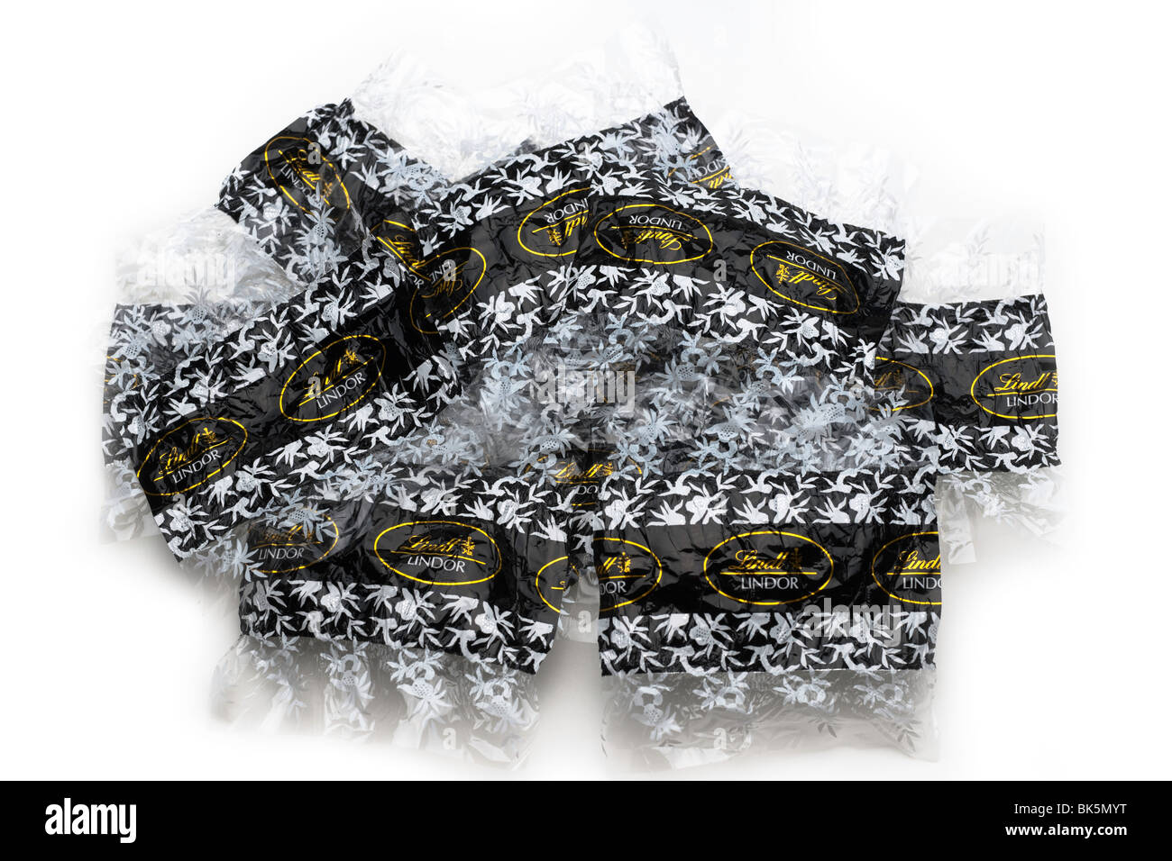 Pile of Lintz Lindor chocolate wrappers Stock Photo - Alamy