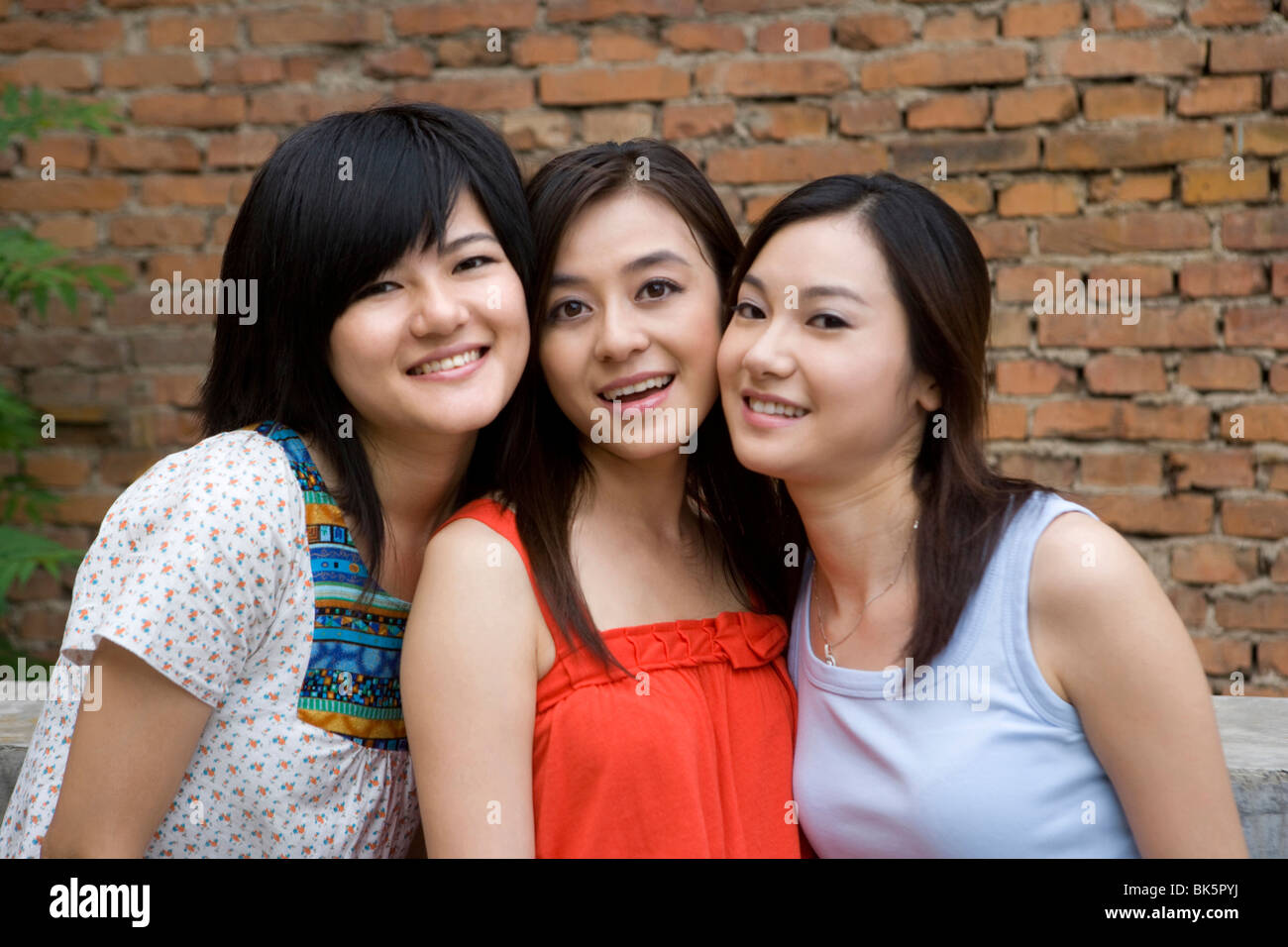 Portrait of three girl friends Stock Photo - Alamy