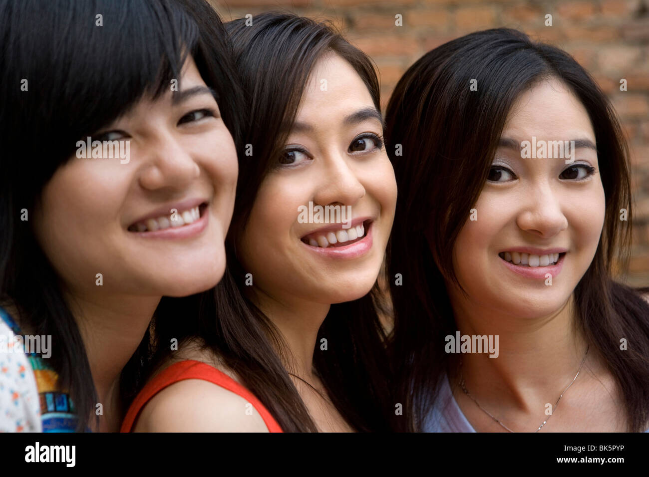 Portrait of three girl friends Stock Photo - Alamy