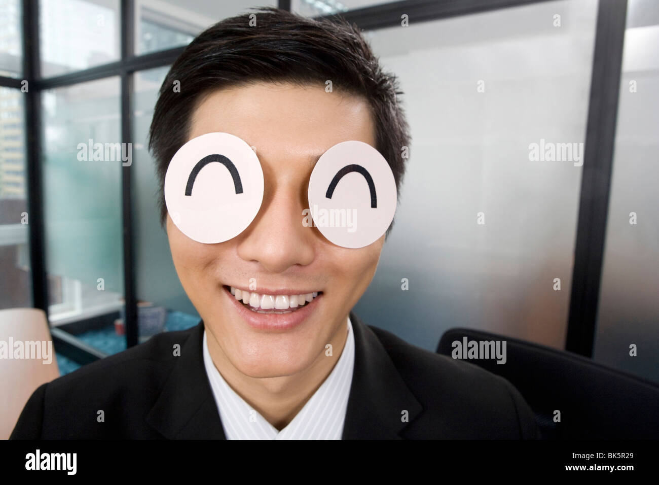 Happy office worker Stock Photo - Alamy