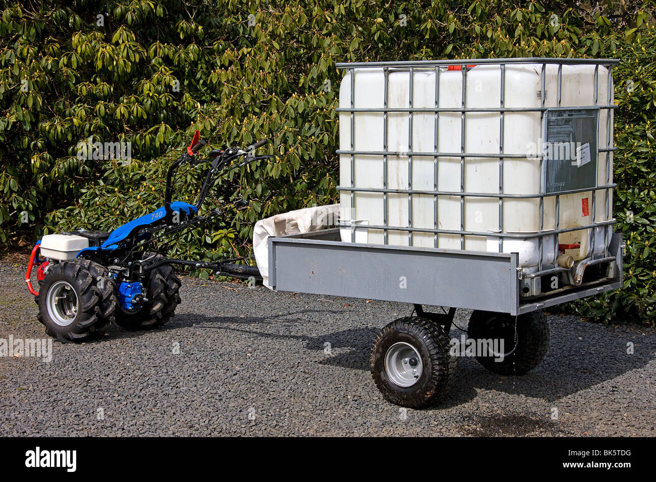 BCS tractor and trailer with water tank Stock Photo - Alamy
