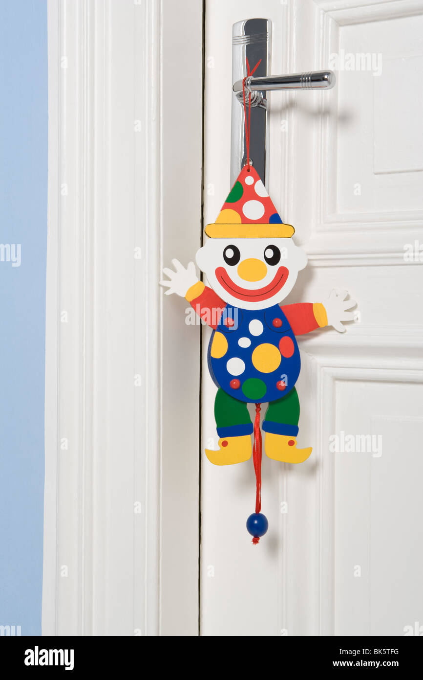Clown Marionette Hanging From Door Handle Stock Photo - Alamy