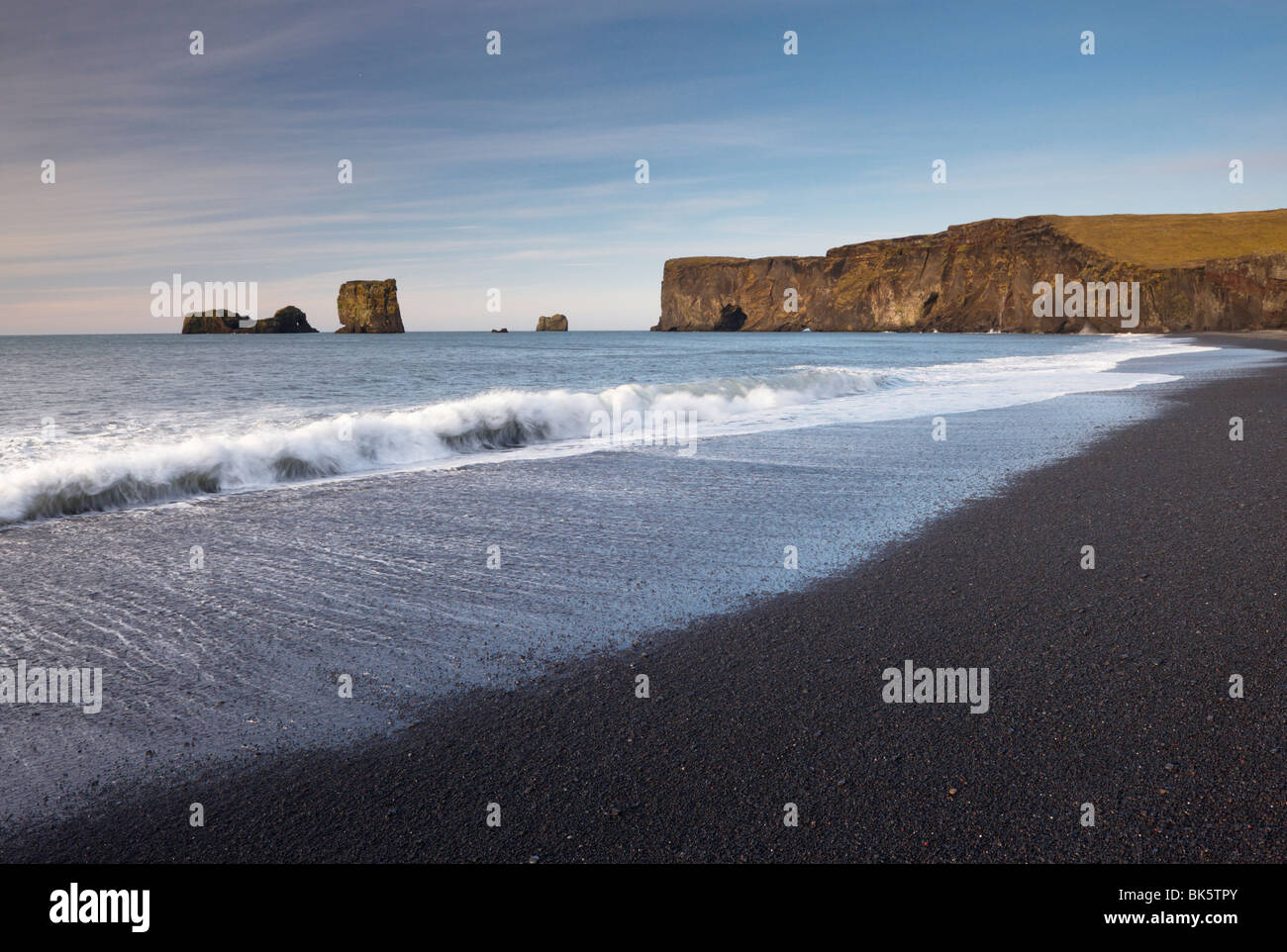 Black sand beach and Dyrholaey natural arch near Vik, south Iceland ...