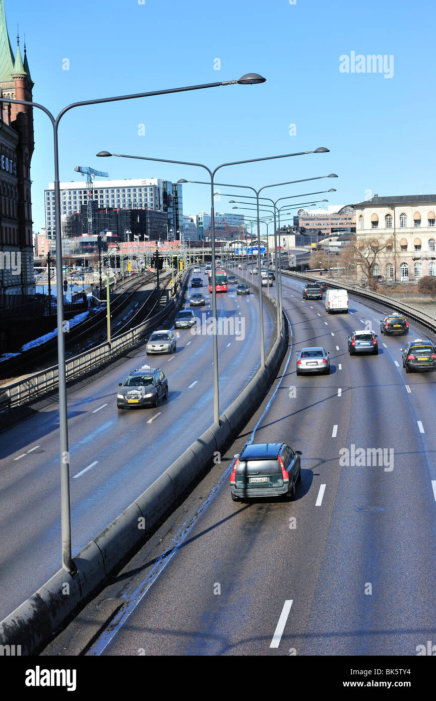 Motorway through a city Stock Photo - Alamy