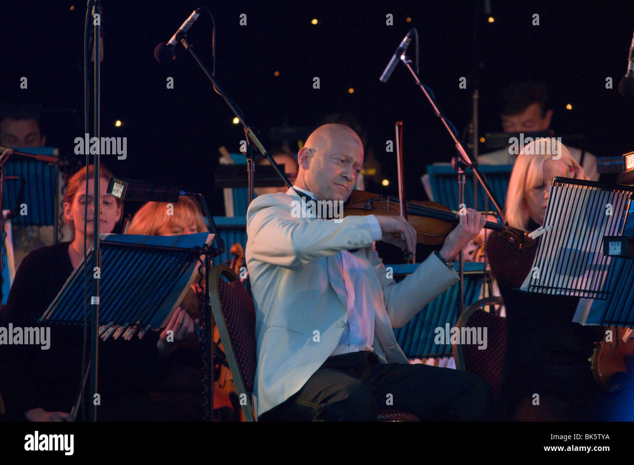 members of London Gala Orchestra Bedford Prom in Park Stock Photo - Alamy