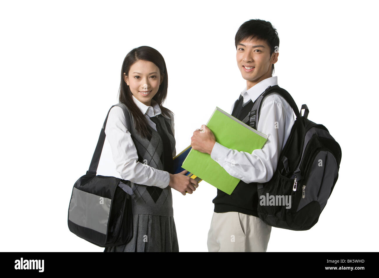Carrying bookbags hi-res stock photography and images - Alamy