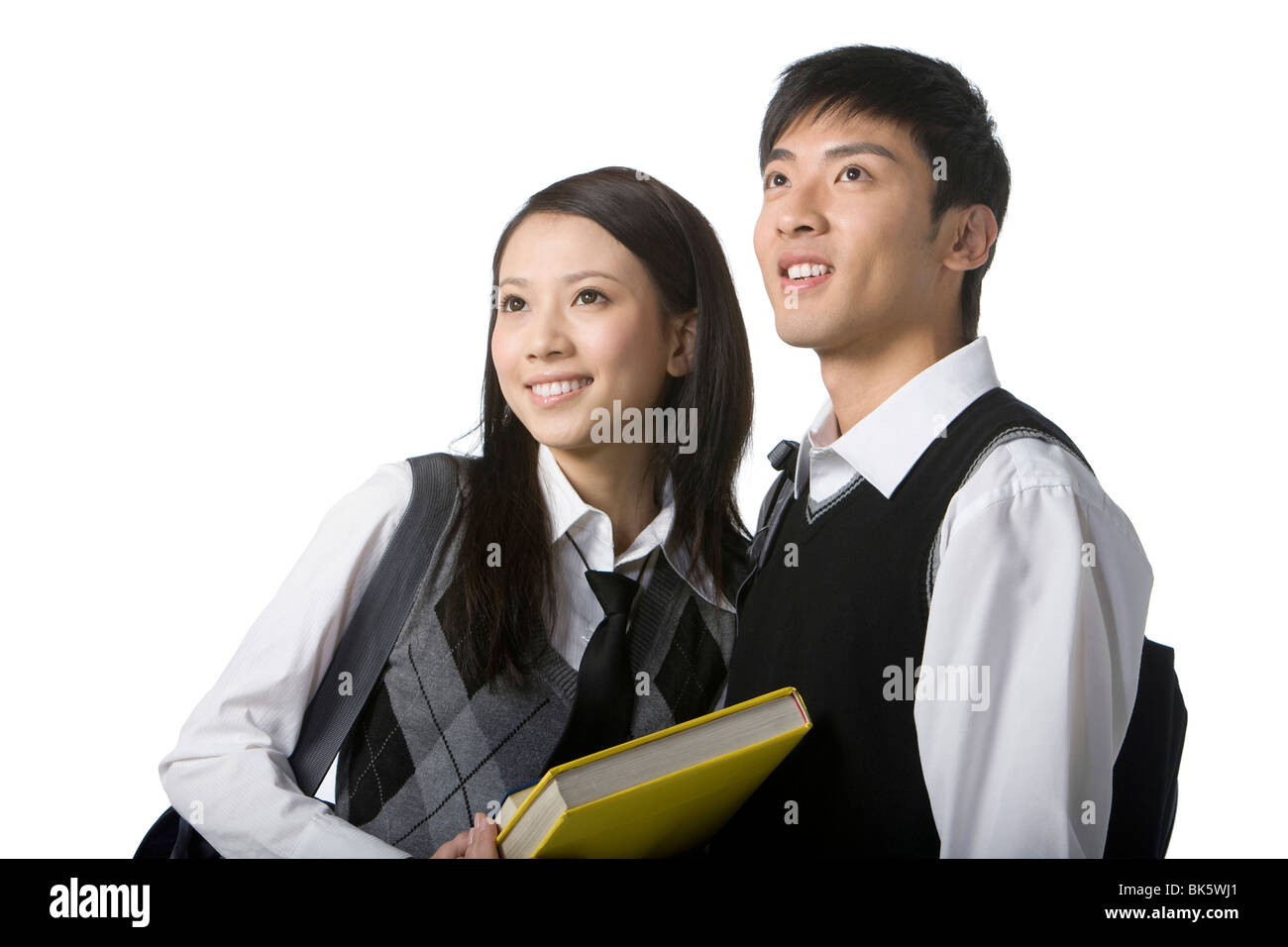Students with bookbags Stock Photo - Alamy