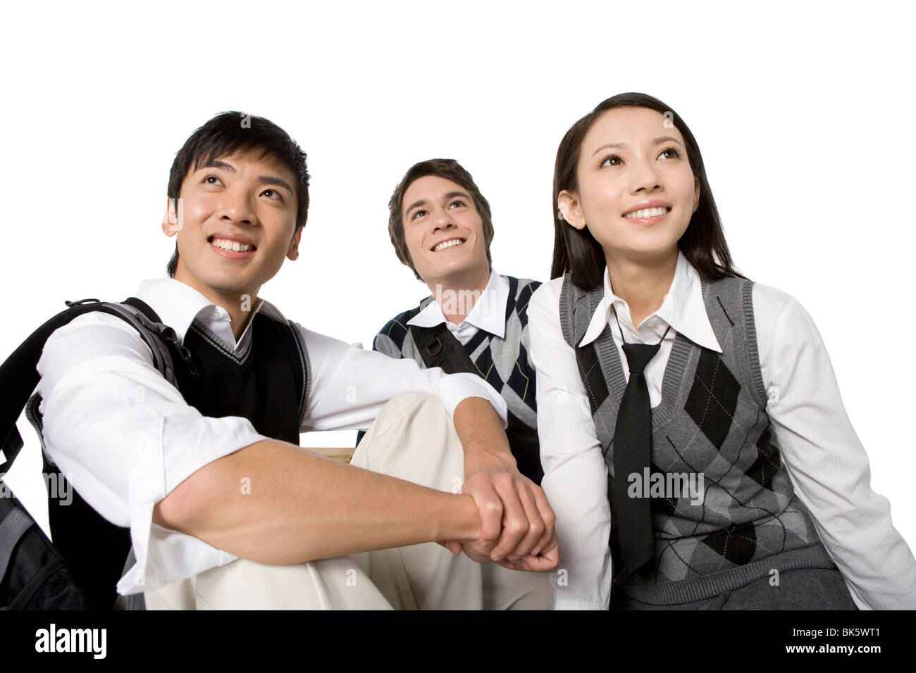 Students sitting on the floor Stock Photo - Alamy
