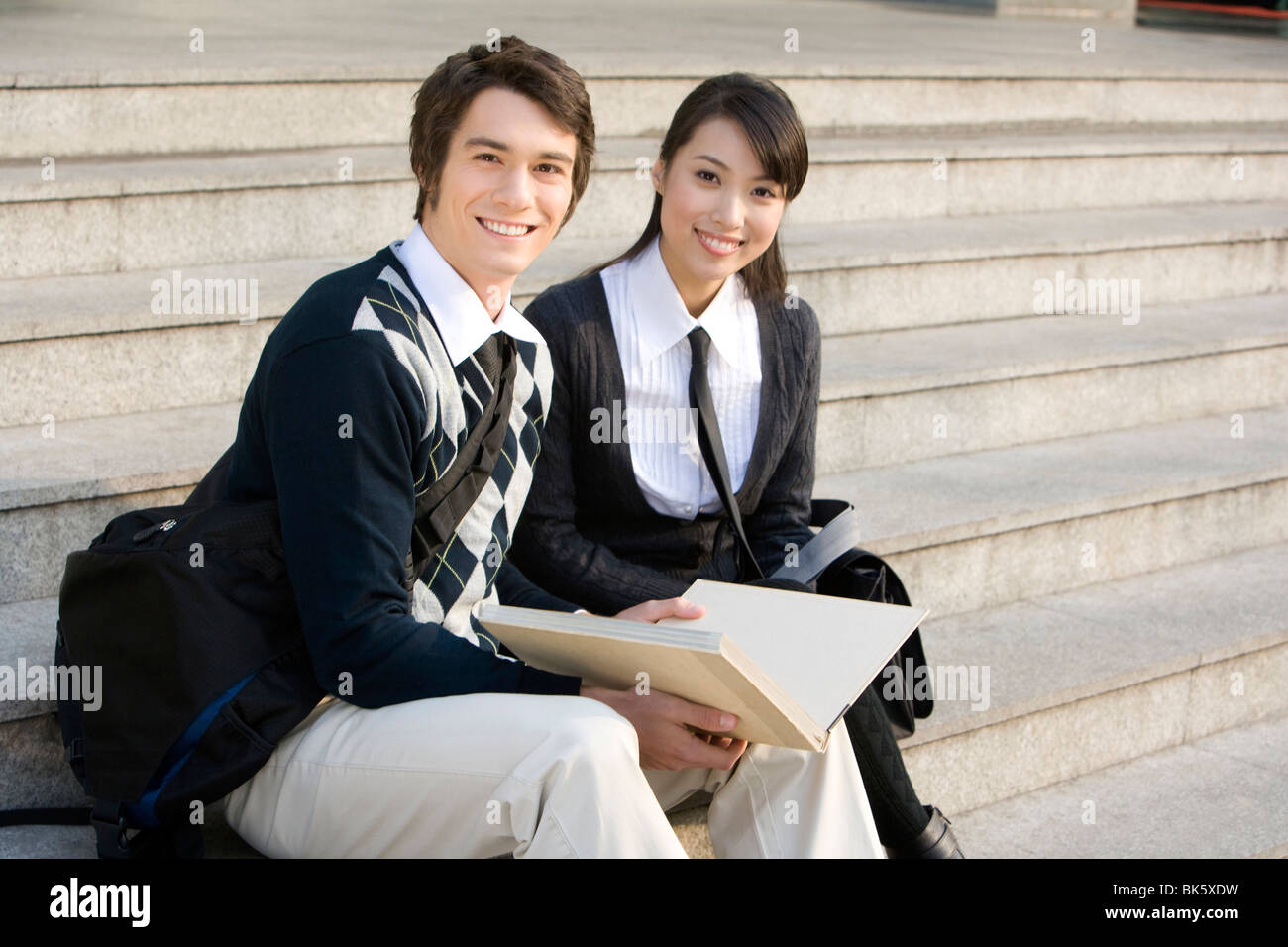 Students on the steps Stock Photo - Alamy