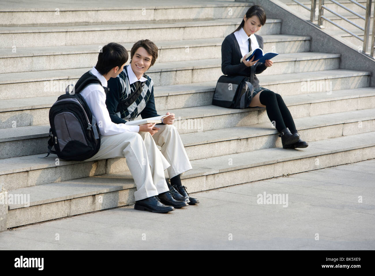 Students on the steps Stock Photo - Alamy
