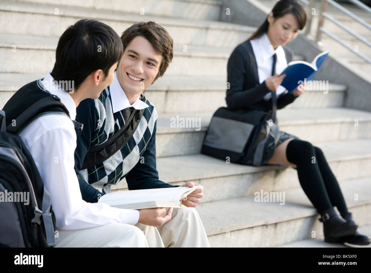 Students on the steps Stock Photo - Alamy