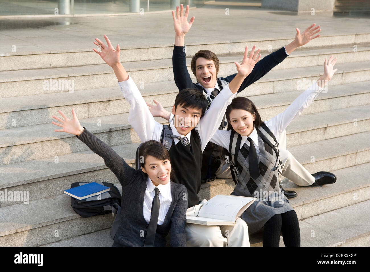 Students on the steps Stock Photo - Alamy