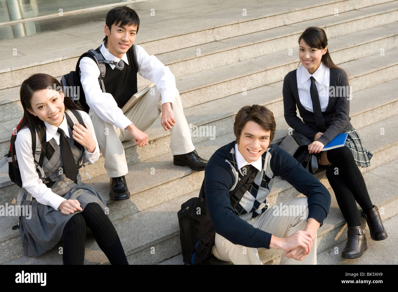 Students on the steps Stock Photo - Alamy