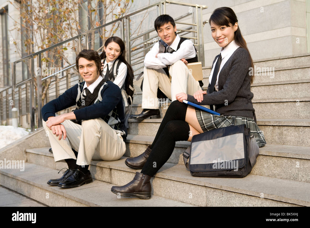 Students on the steps Stock Photo - Alamy