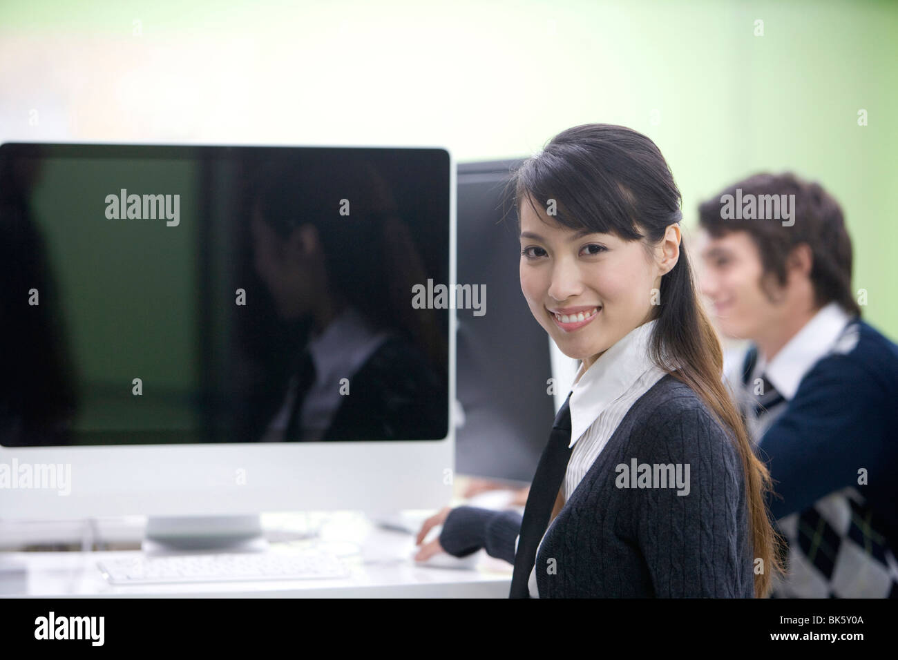 Young women students using computer lab hi-res stock photography and ...
