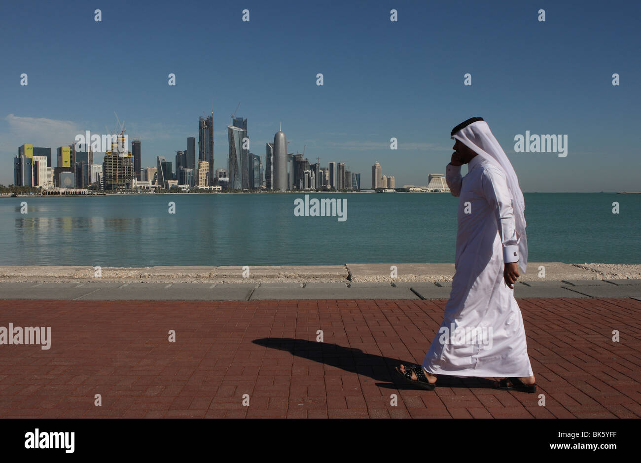 Arab man walking hi-res stock photography and images - Alamy