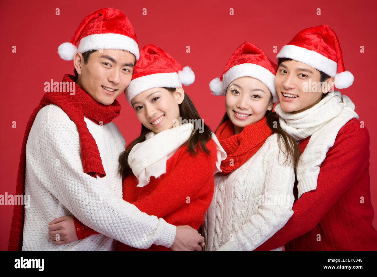 Friends celebrating Christmas Stock Photo - Alamy