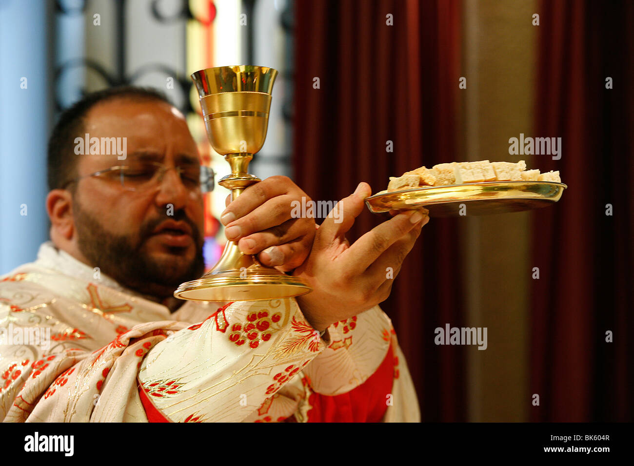 Melkite priest celebrating Mass, Nazareth, Galilee, Israel, Middle East ...