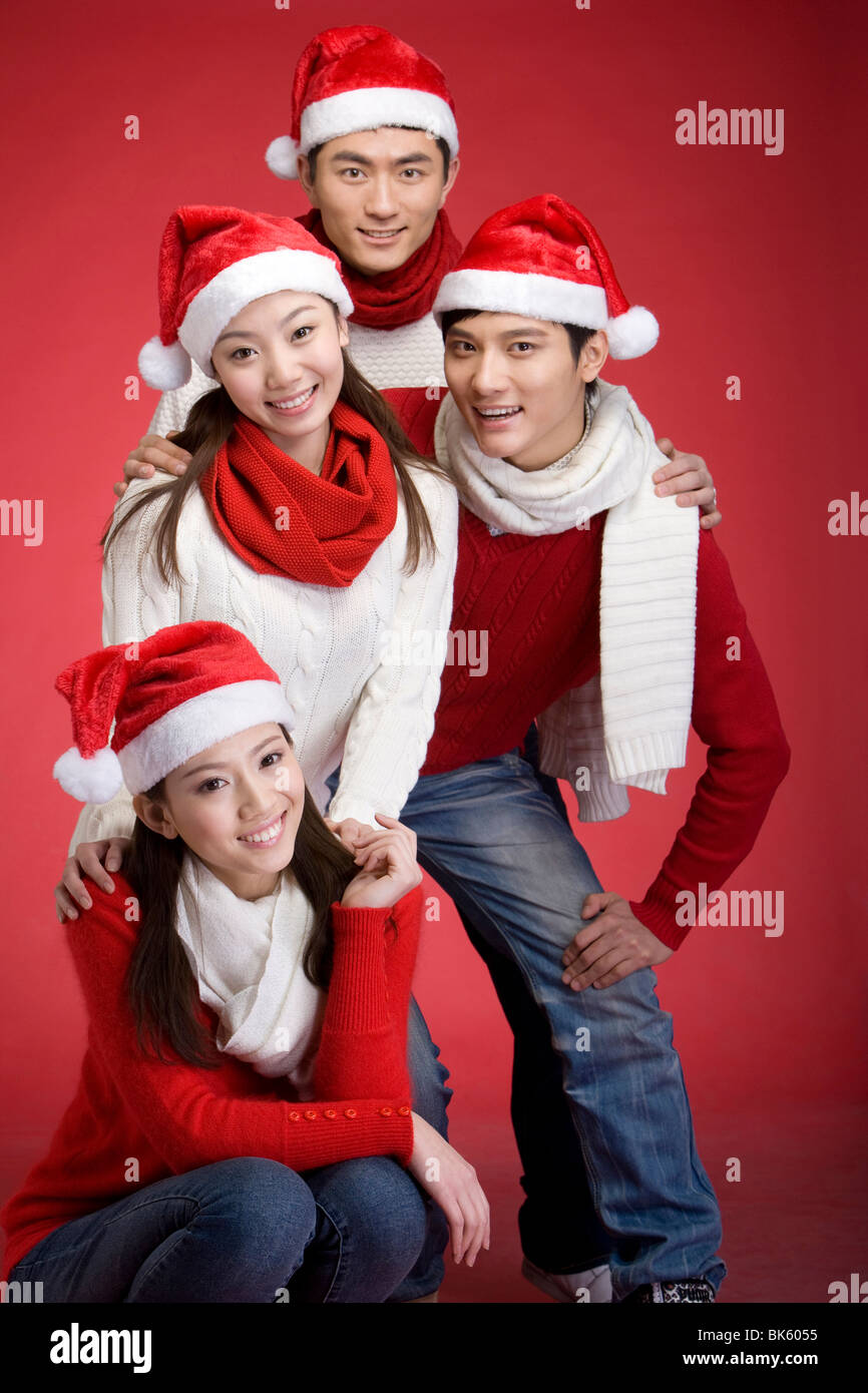 Friends celebrating Christmas Stock Photo - Alamy