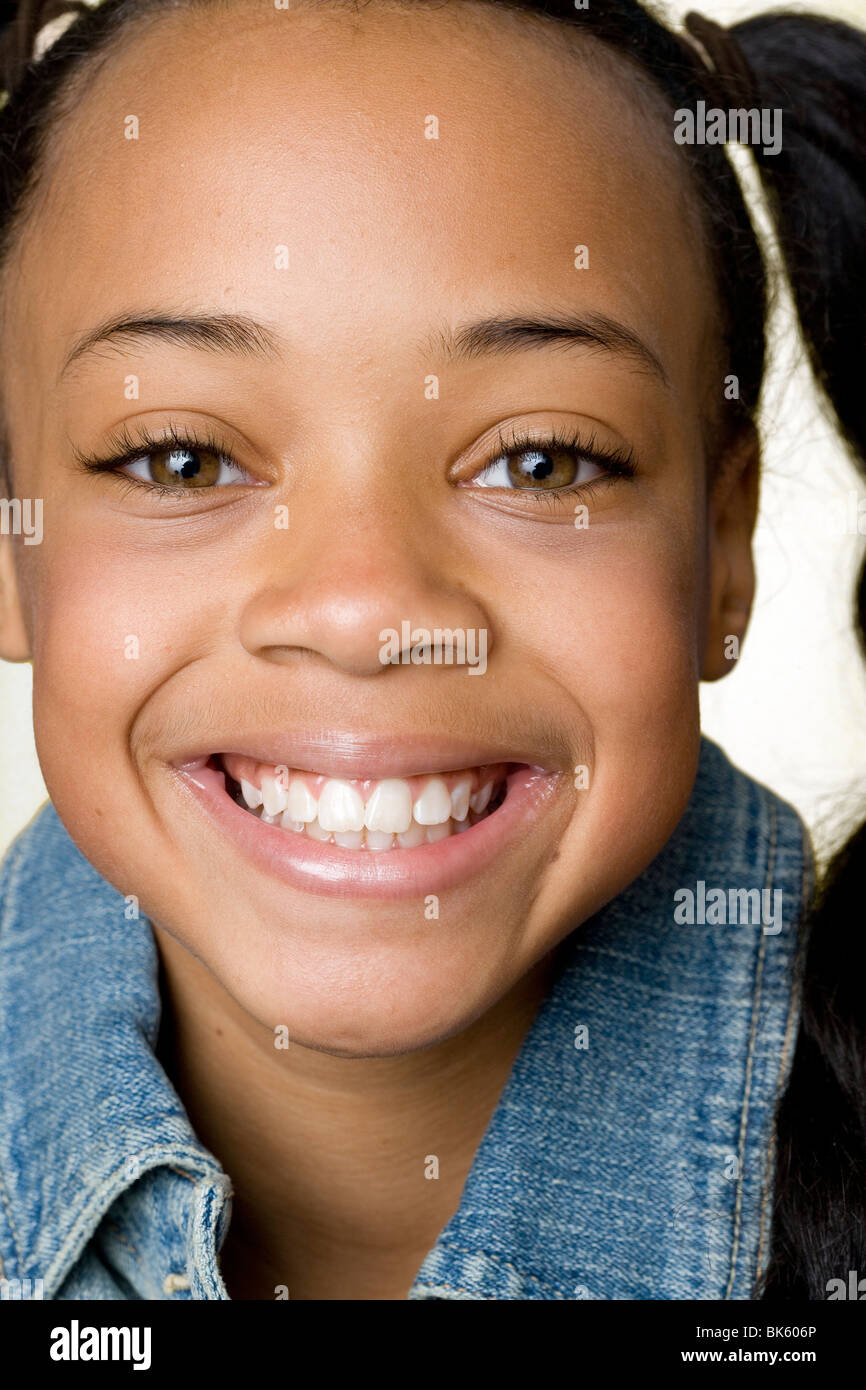 Close-up of a girl smiling Stock Photo - Alamy