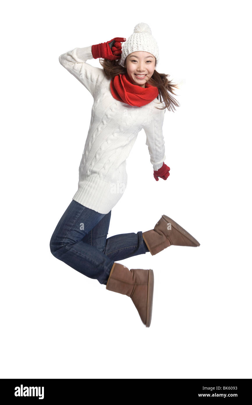 Young woman jumping Stock Photo - Alamy