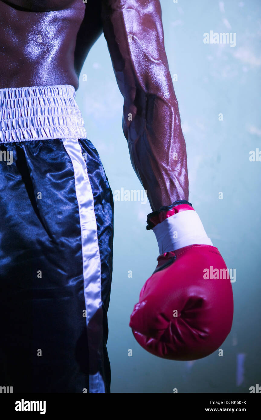 Mid section view of a boxer wearing a glove Stock Photo - Alamy
