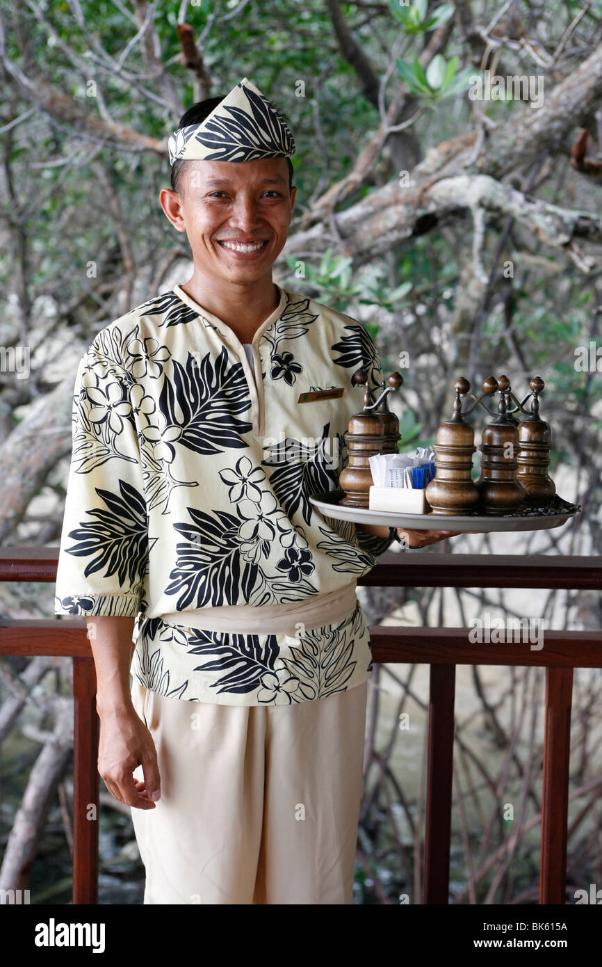 Indonesian waiter at the Banyan Tree hotel, Bintan, Indonesia ...