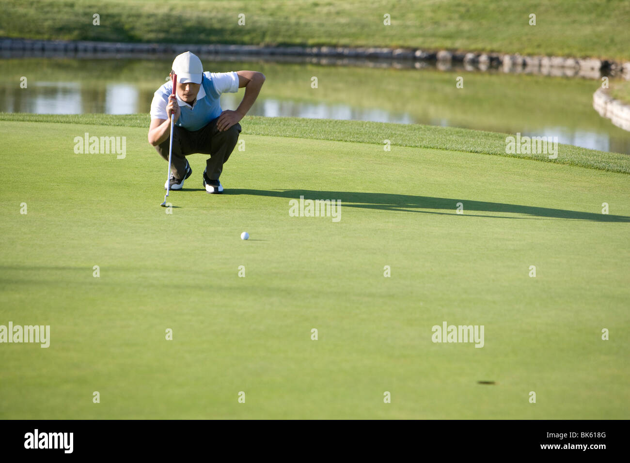 Glofer observing on the Green Stock Photo - Alamy